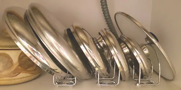 DIY Inexpensive Pot Lid Storage from Dollar Tree | AllMomDoes