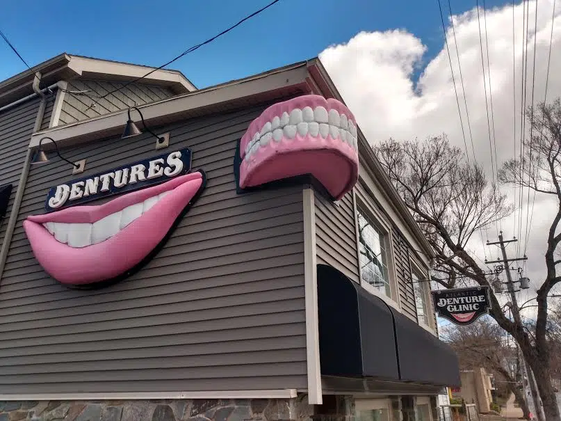 Police Remove Signs For Denture Clinic Owned By Gunman | 101.5 The Hawk