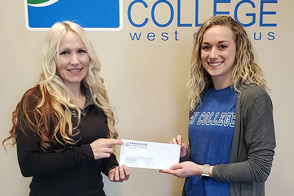 Danielson Insurance Donates Scholarship To Bay | Radioresultsnetwork.com