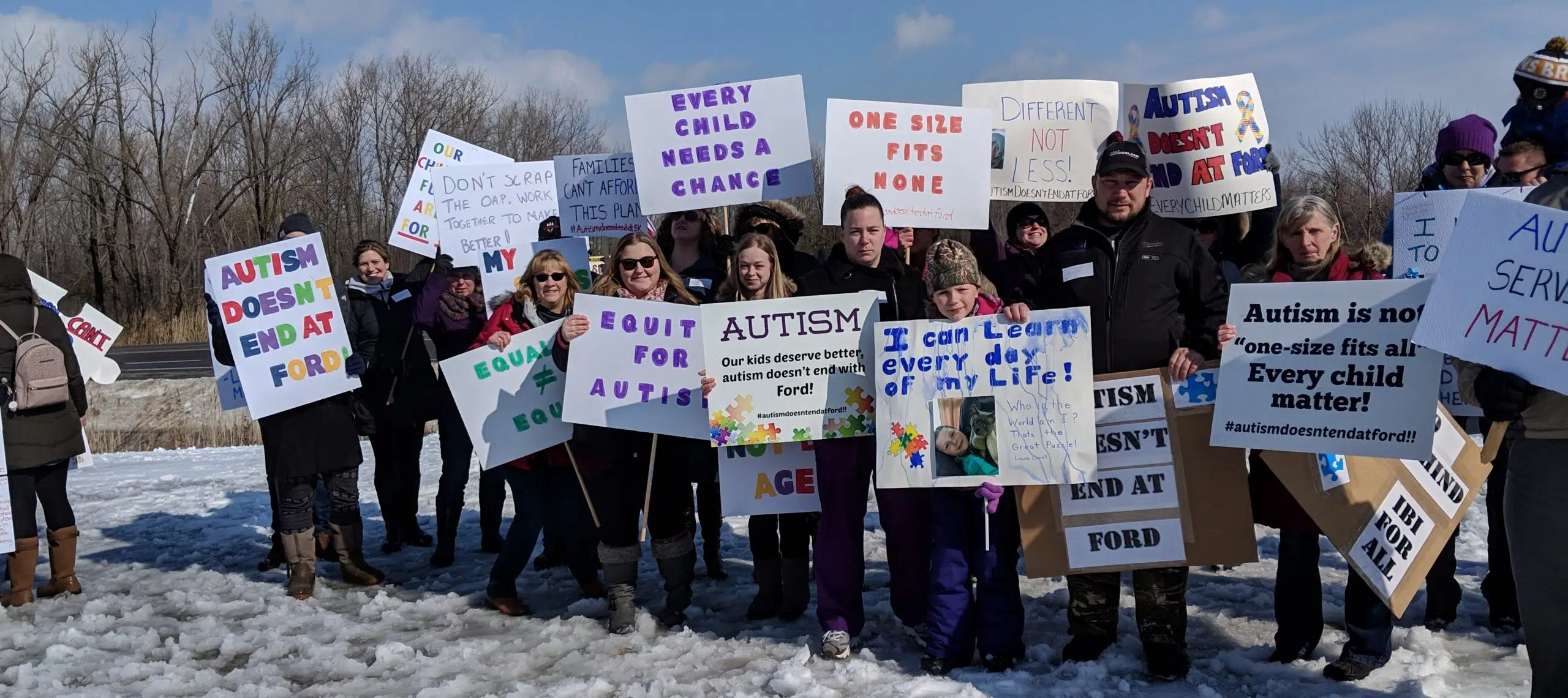 Parents and supporters rally against autism funding changes | Quinte News