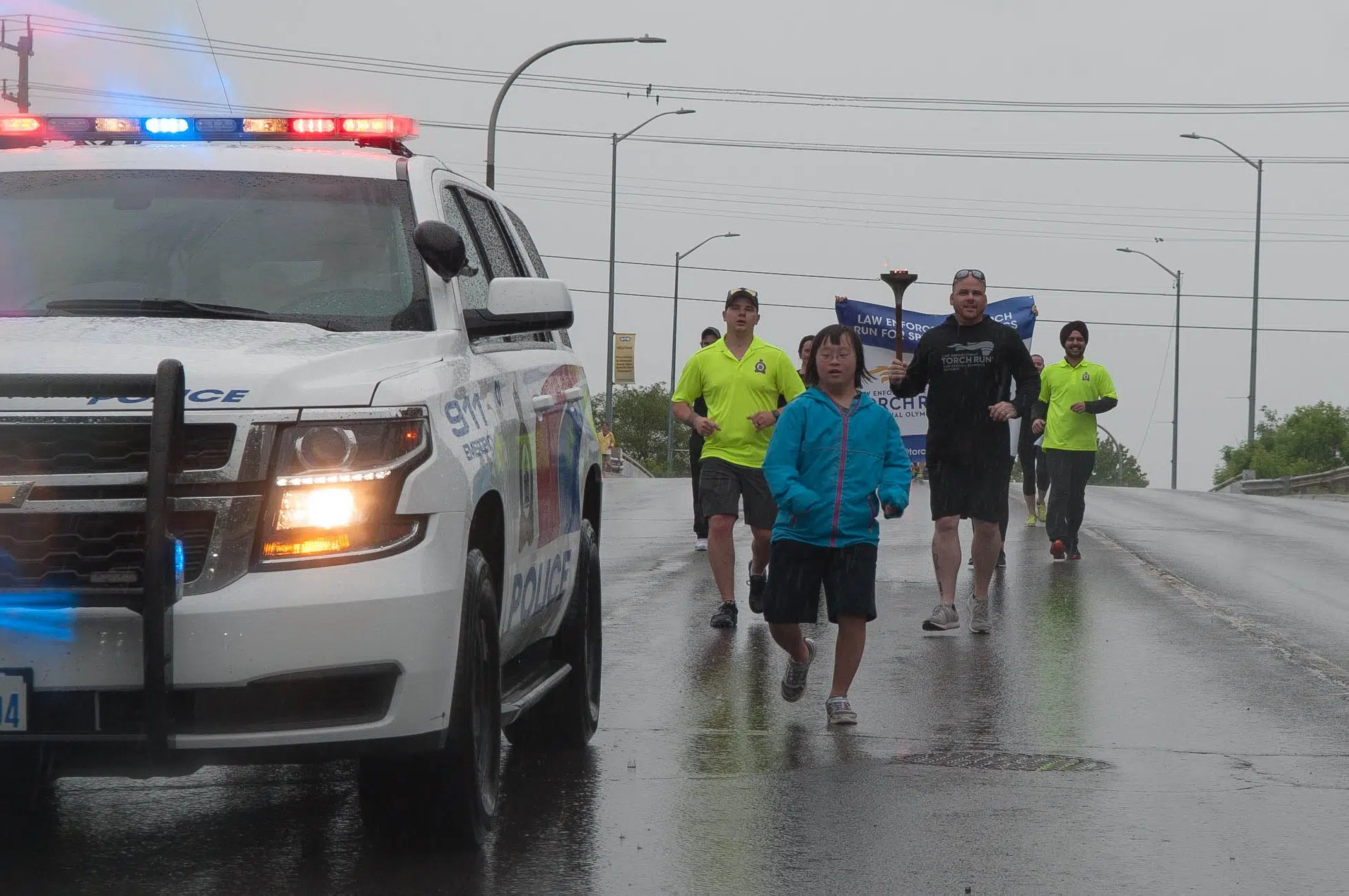 Rain doesn’t dampen spirits for 2019 Belleville Law Enforcement Torch ...