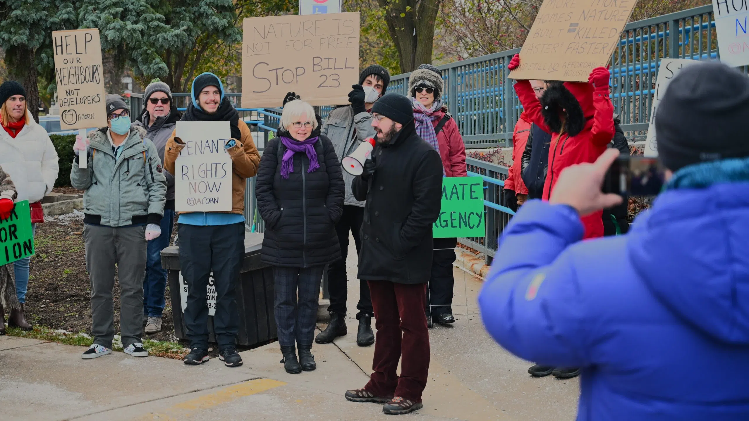 Dozens of Londoners stood outside City Hall to protest against Ontario ...