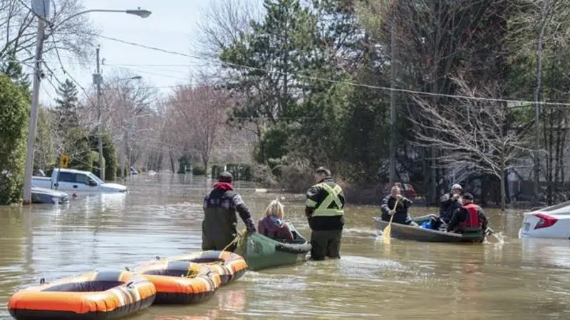 Vignettes from a Quebec flood zone, where burst dike forced mass ...