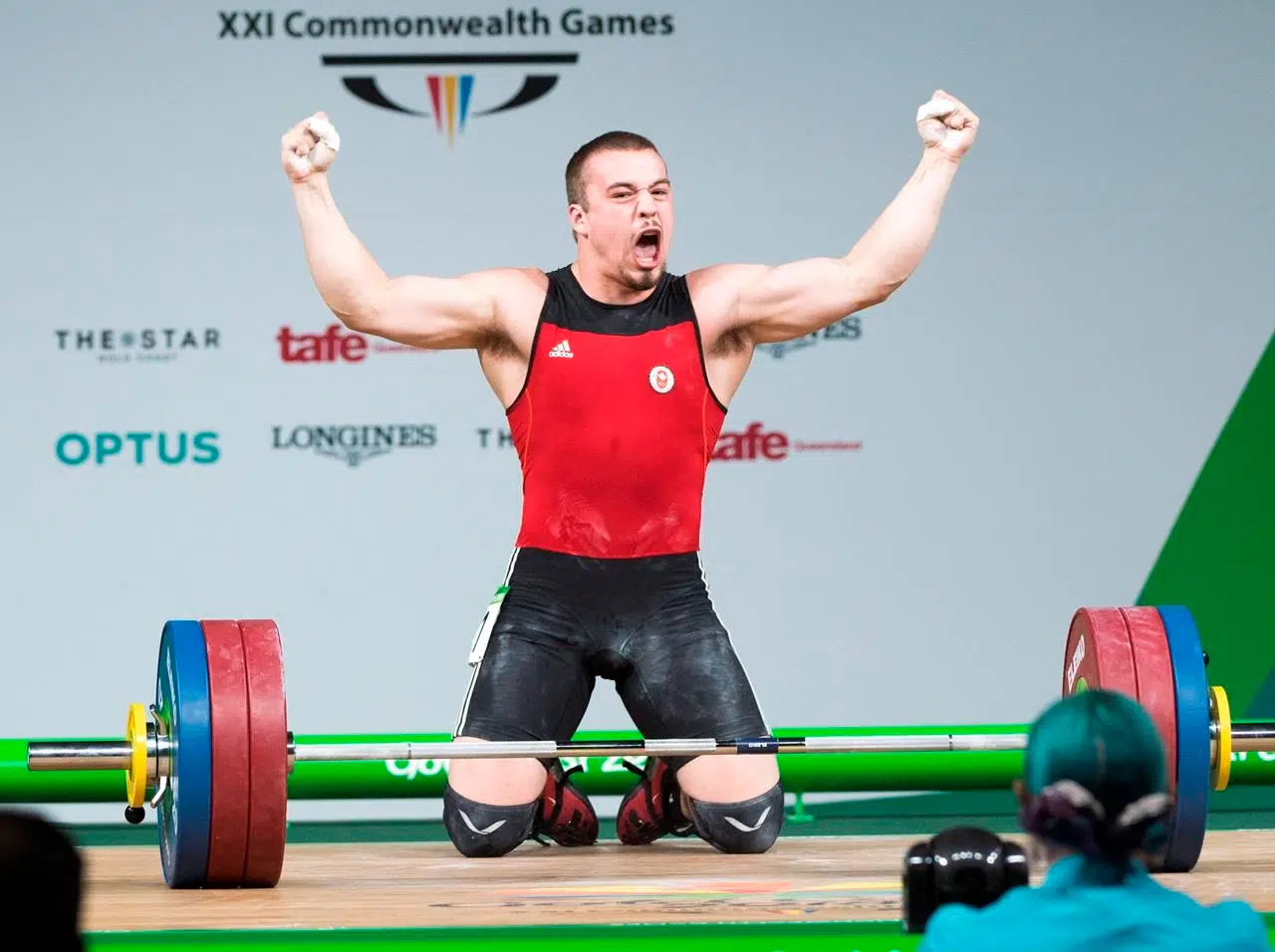 Canadian weightlifter settles for silver on day of drama at ...