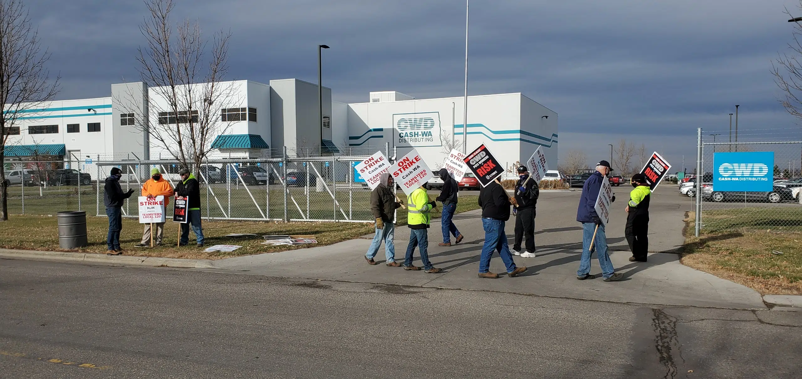 Teamsters members hit picket line outside Fargo food wholesaler | The ...