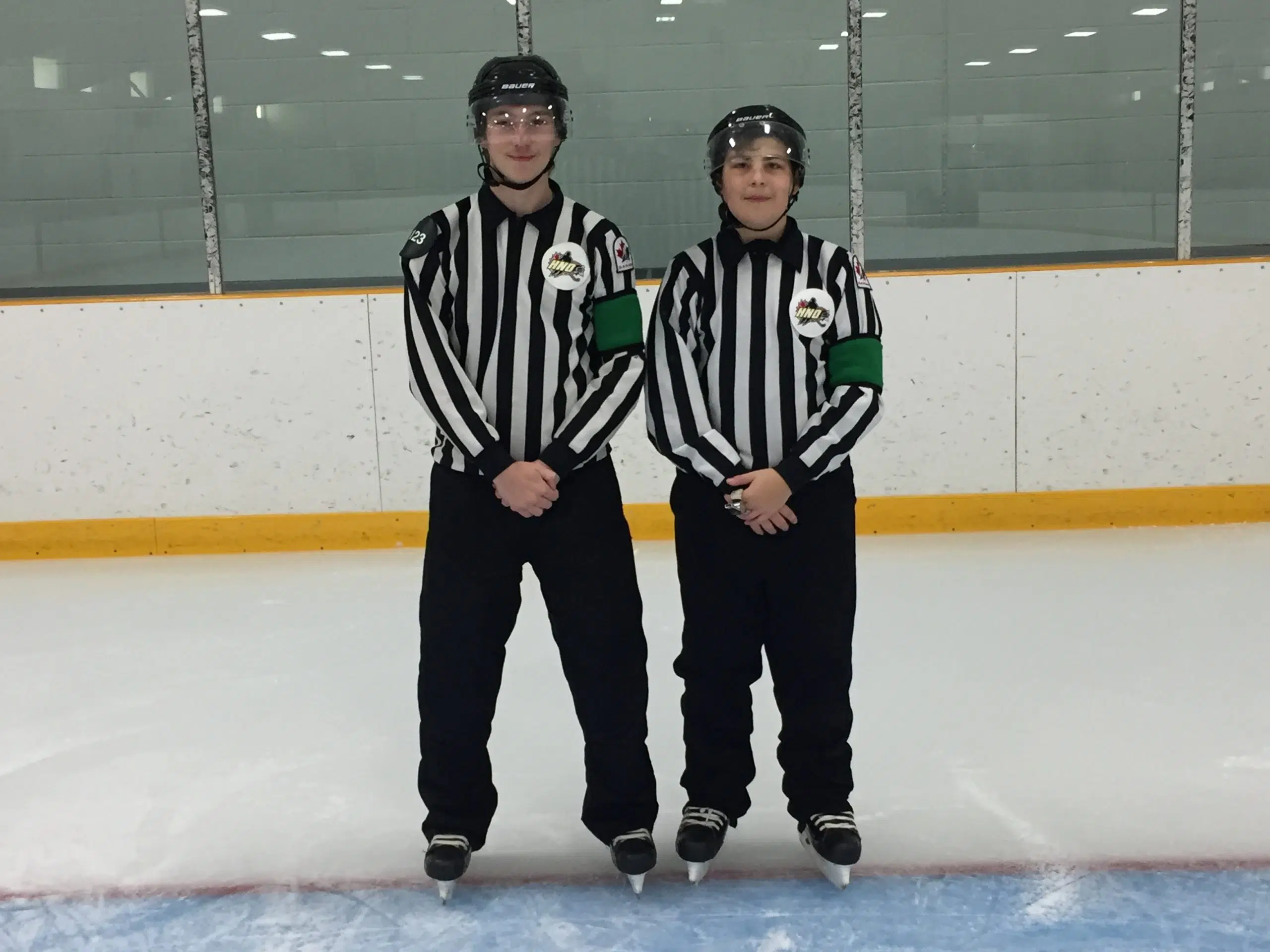 Young Hockey Officials Sport Green Arm Bands | 101.5 The Hawk