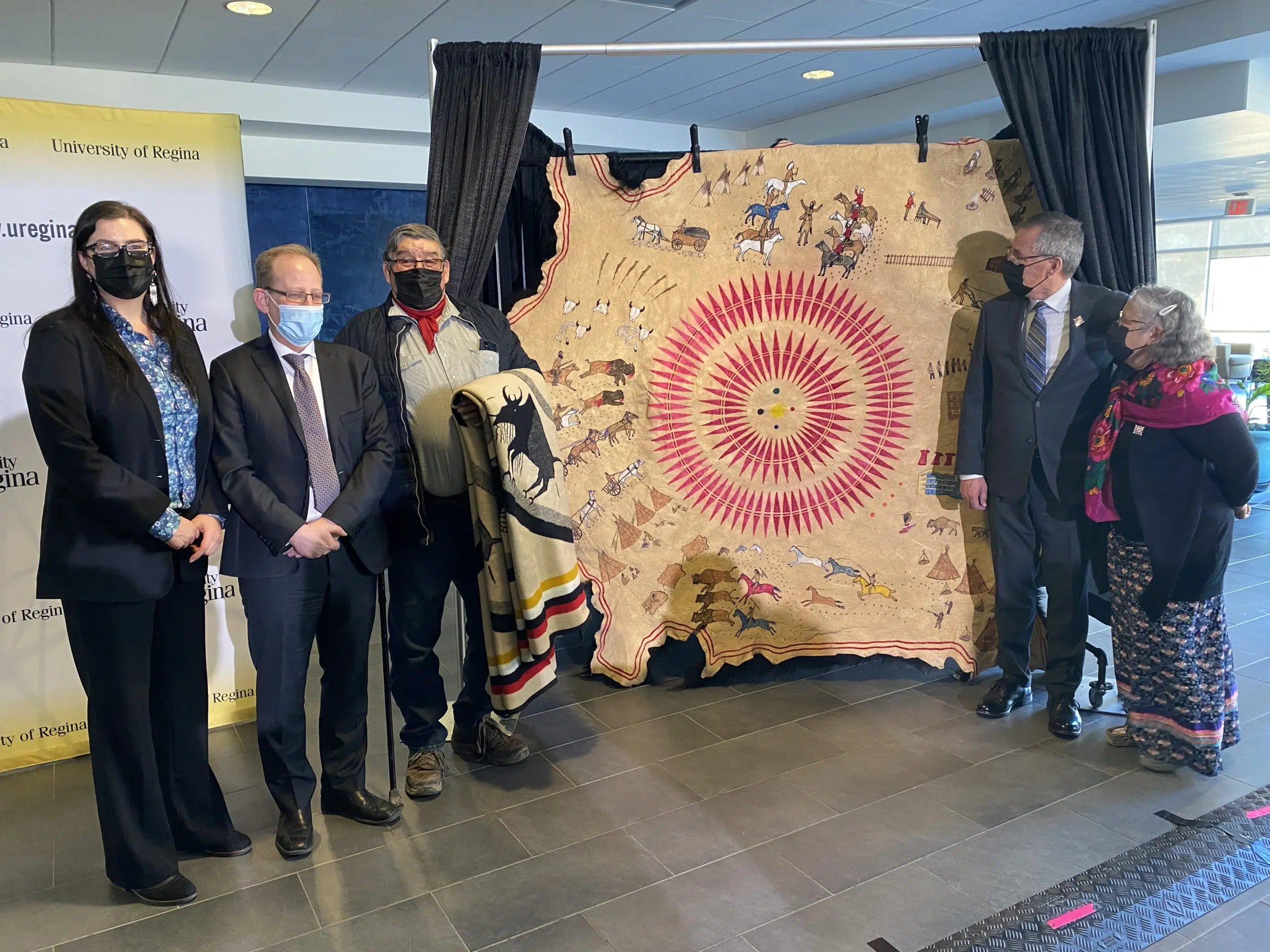 Goodwill designs buffalo winter count robe for University of Regina ...