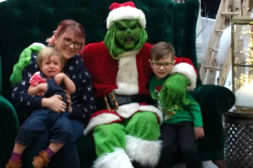 Popular photos with the Grinch spark some smiles and tears | 980 CJME