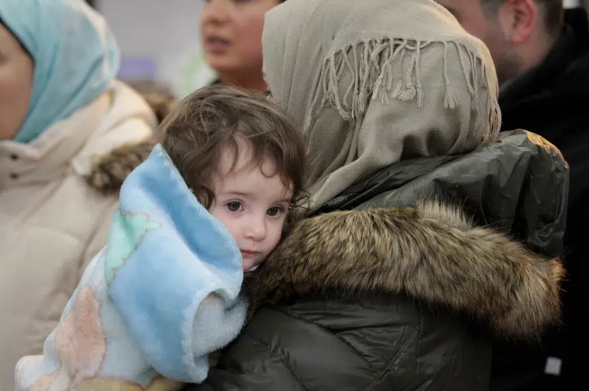 Applause, song welcome 3 Syrian refugee families to Saskatoon | 650 CKOM