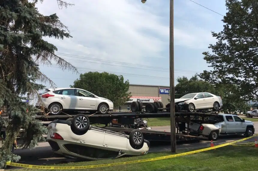 Collision spills cars off trailer in north Saskatoon | 650 CKOM