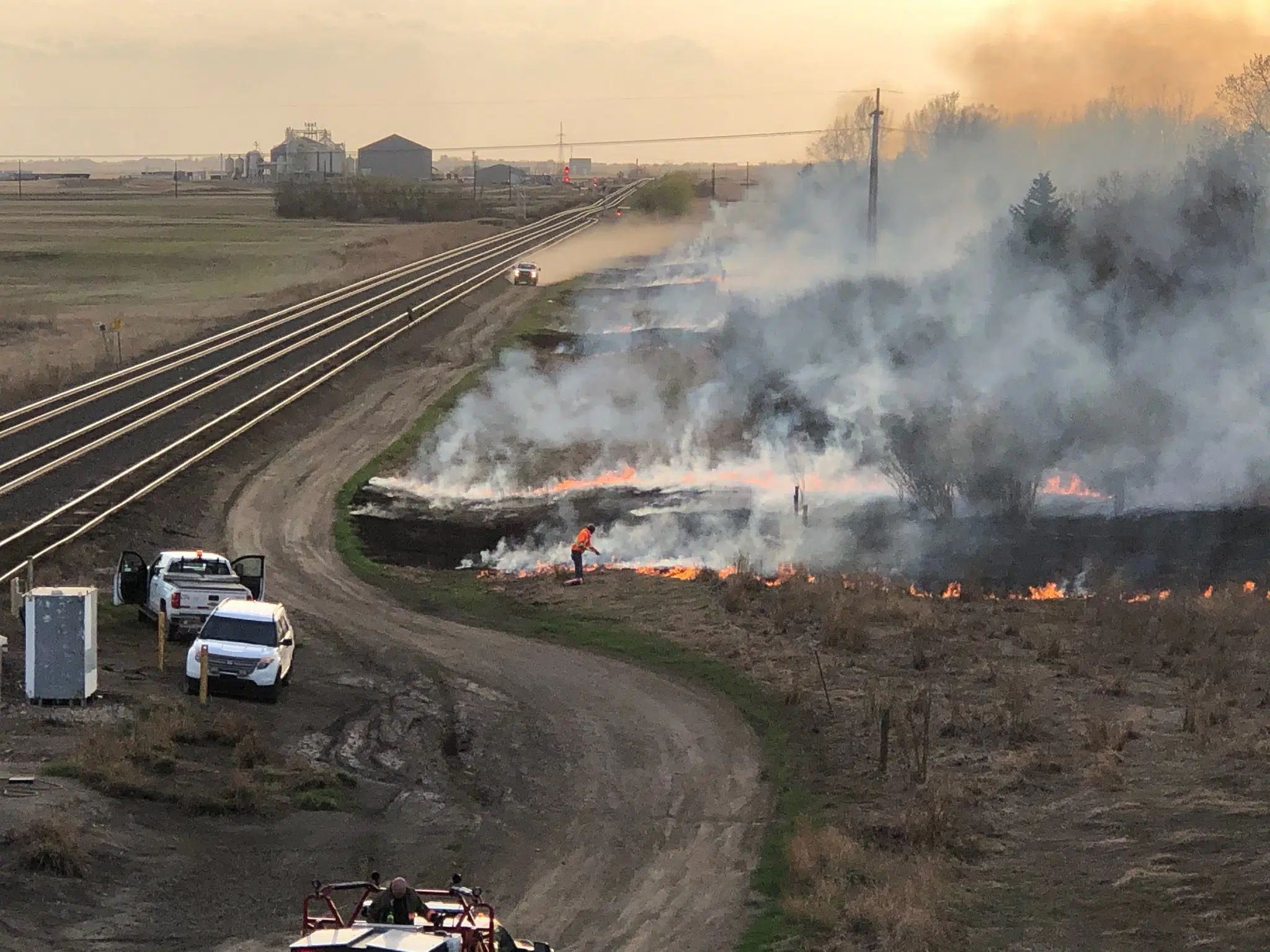 Grass fire scorches small area near Highway 7 and CN Railway tracks ...