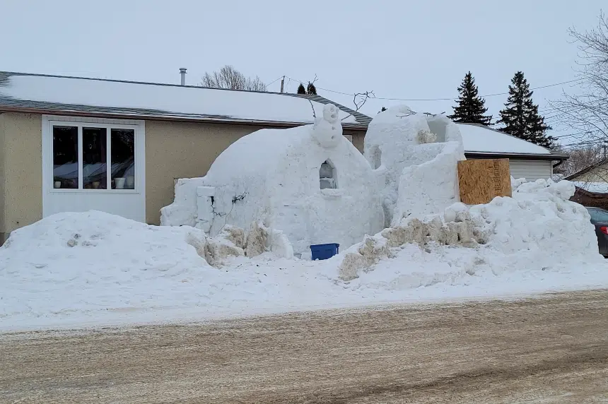 Saskatoon man builds massive snow castle in front lawn | 650 CKOM