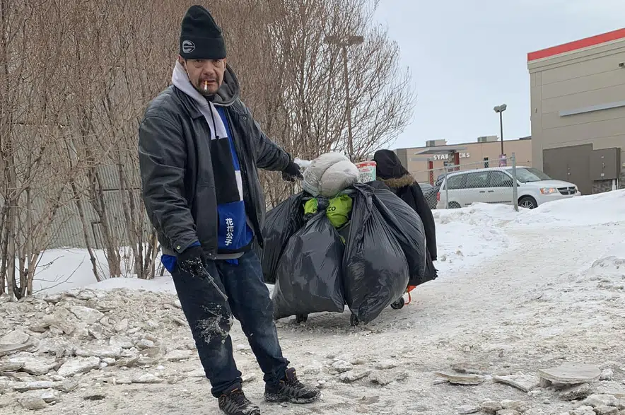 ‘It puts a smile on my face:’ Saskatoon homeless snow angel clears icy ...